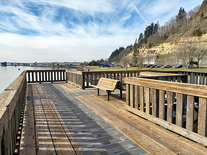 Morrison Riverfront Park's walkway overlooks the water, perfect for those contemplative strolls that don't require gym memberships or fancy gear.