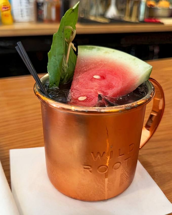 This Moscow Mule comes with a watermelon wedge that's not just garnish—it's summer in solid form, ready to dive into your copper mug of refreshment.