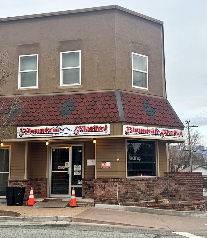 Mountain Market anchors a corner with small-town essentials. When you need milk at 7 AM, this is where locals gather to debate the weather forecast.