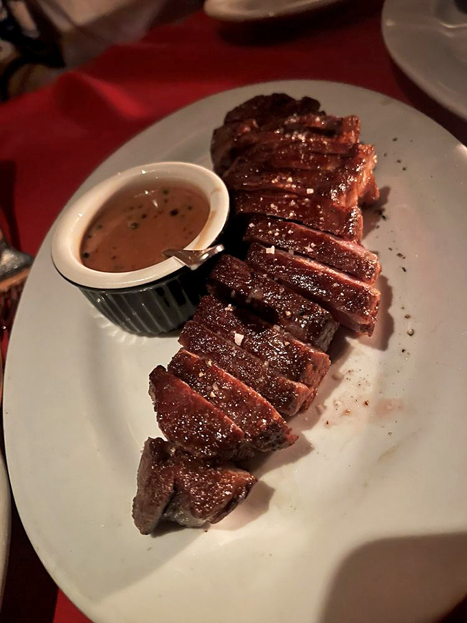 New York strip with grill marks so perfect, they could teach a masterclass in geometry.