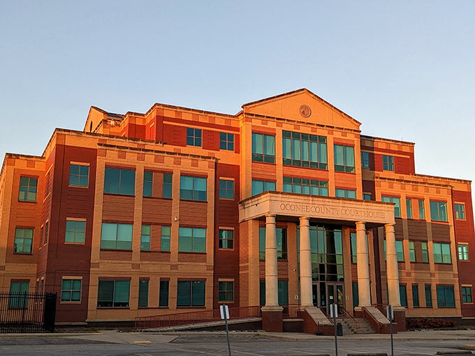The Oconee County Circuit Court building glows in sunset light, an impressive civic anchor in this affordable mountain town.