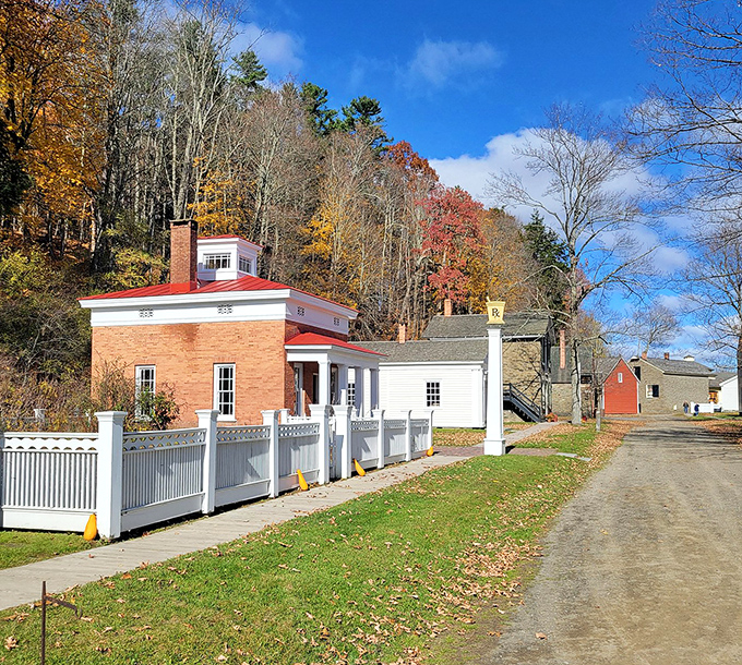 A historic building complex that hasn't surrendered to the modern world. Fall foliage provides a backdrop that no developer's rendering could improve upon.