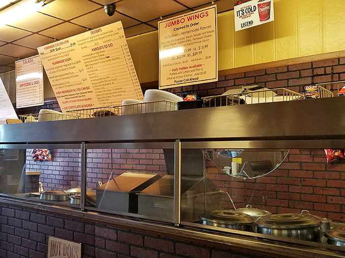 The counter and kitchen area showcase the no-frills approach that's kept Harold's thriving&mdash;good food doesn't need fancy surroundings.