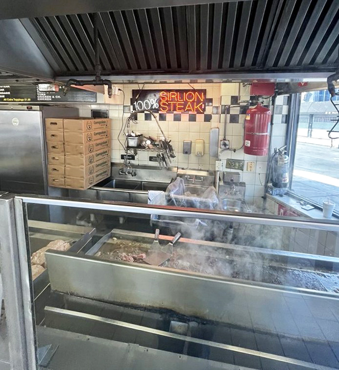 Behind the scenes where magic happens. That sizzling grill has probably cooked enough meat to fill Citizens Bank Park.