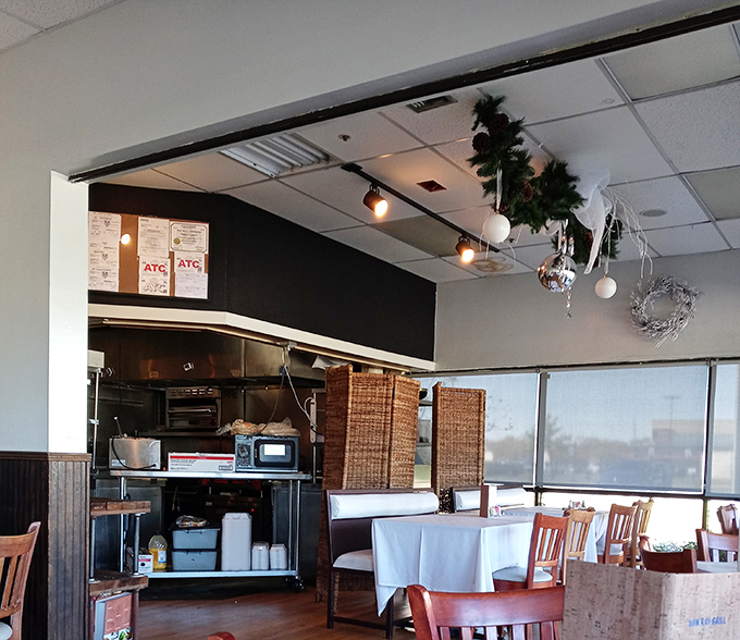 The semi-open kitchen design lets you witness culinary magic without seeing the sweaty parts&mdash;like a PG version of "Kitchen Confidential."