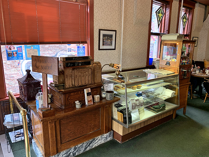 The dessert case and vintage counter: where willpower goes to die and "I'll just have coffee" turns into "and a slice of pie, please."
