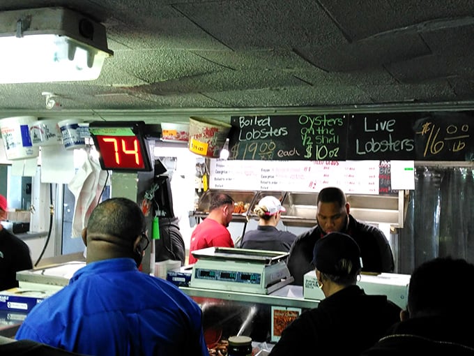 The pickup window: that magical portal where your name is called and smoky treasures appear. Like Christmas, but with more sauce.