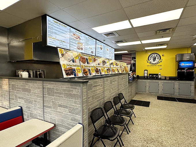 The order counter's stone facade and expansive menu board create that perfect "decision paralysis" moment where everything sounds too good to choose just one.