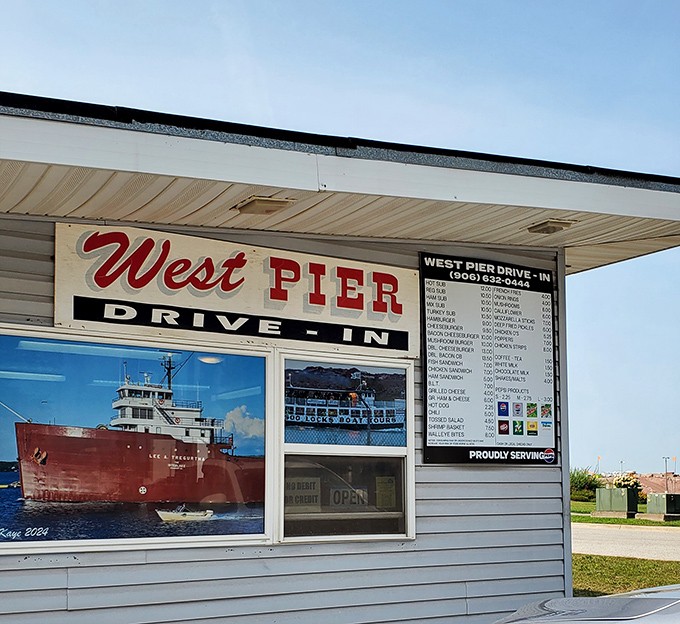 The ordering window—where dreams begin and hunger ends. That ship photo reminds you you're in a true maritime community.