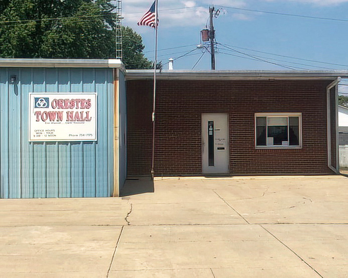 The unassuming Town Hall reflects Orestes' practical approach to governance—no marble columns needed when neighbors govern neighbors.