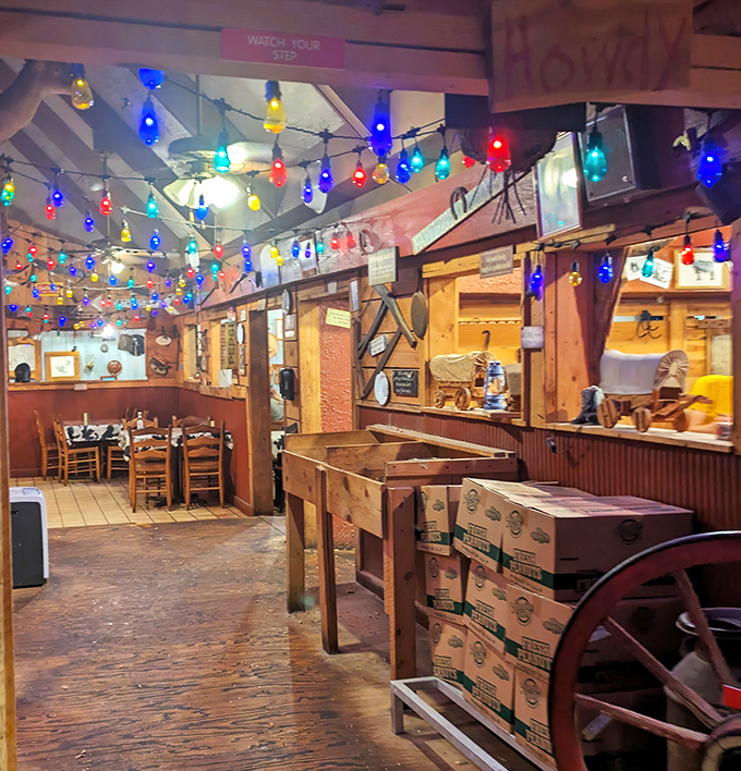 Colorful string lights and rustic wood create that rare atmosphere where you instantly feel like a regular, even on your first visit.