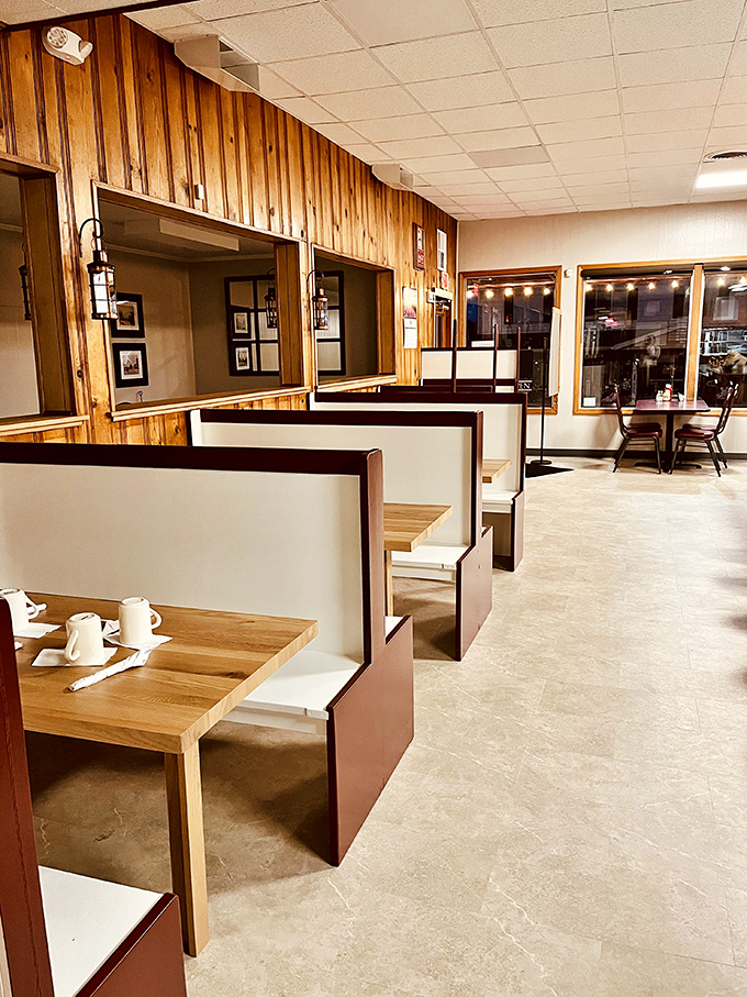Wooden booths polished by decades of elbows tell silent stories of family celebrations, first dates, and countless "we should split a piece of pie" negotiations.