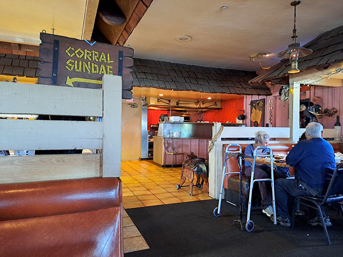 The "Corral Sundae" sign points the way to dessert paradise. Even the most dedicated carnivores need to save room for this sweet finale.