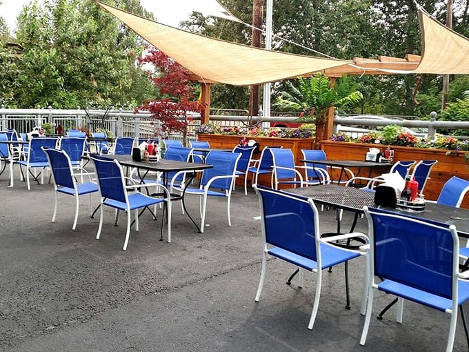 Blue chairs under sail-like canopies&mdash;nautical dining without the seasickness. The perfect spot for summer seafood feasting.