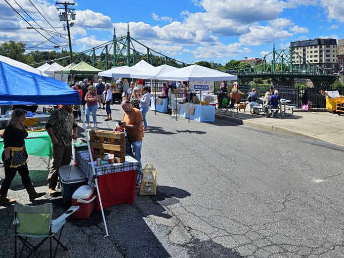 The riverside farmers market offers fresh produce and local crafts with the bonus of bridge views that don't cost extra.