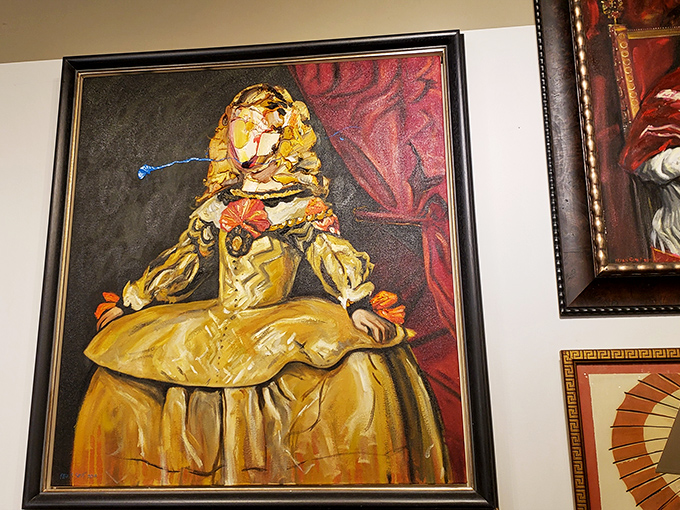 The vintage sign hanging proudly above the street—a beacon for collectors and design enthusiasts seeking "Fine Antiques" in Columbus's urban landscape.