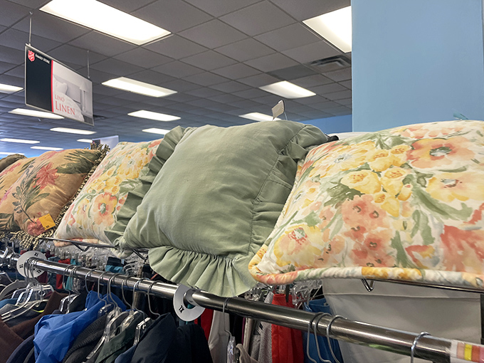 Pillows with personality line the racks &ndash; floral patterns that once adorned someone's sunroom now ready for your lanai's second act.