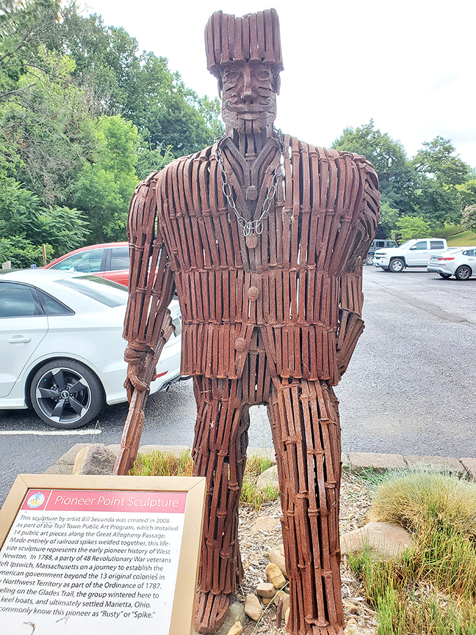 "Rusty" stands guard outside, a quirky wooden sentinel crafted from history. He's seen thousands of satisfied diners come and go along the trail.