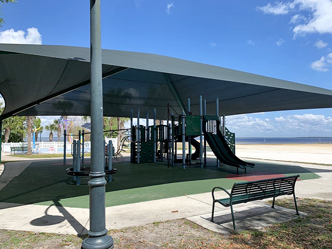 Kid-tested, parent-approved: The shaded playground offers a sandy reprieve when little ones need a break from splashing.