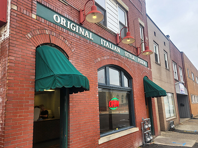 Original Italian Style Pizza&mdash;where the green awnings promise authenticity and the aroma delivers on that promise with interest.