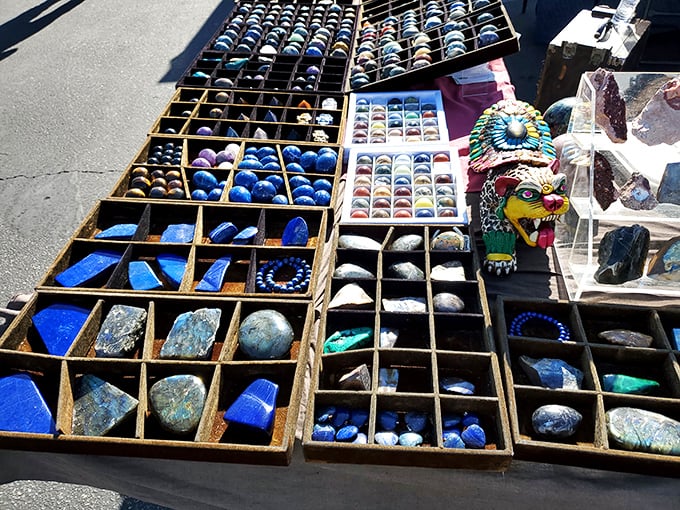 Nature's jewelry box spilled open &ndash; lapis lazuli, turquoise, and quartz arranged in wooden compartments like an earthbound constellation.