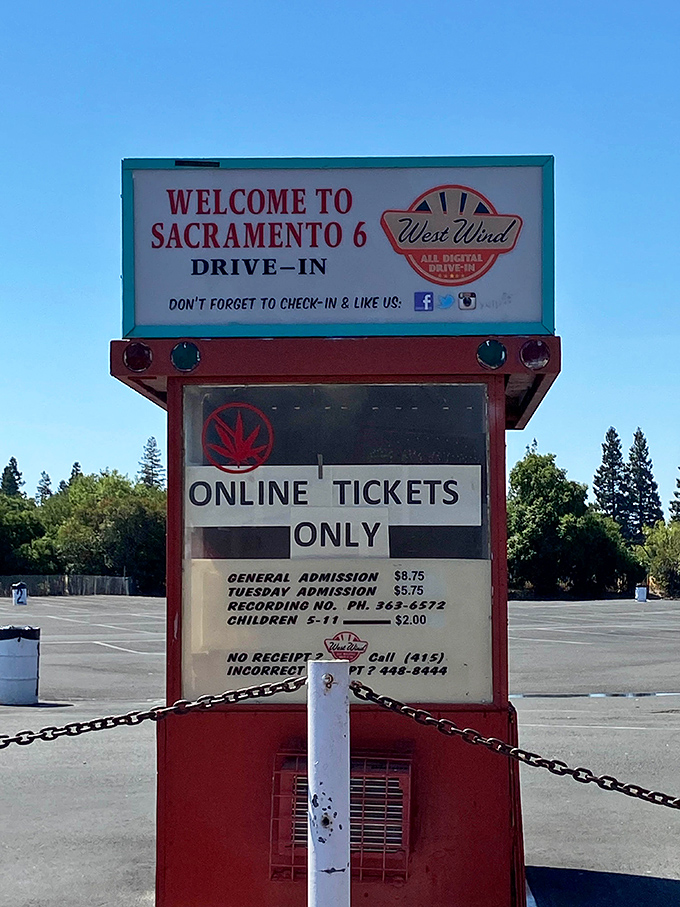 The fine print of fun! This vintage ticket booth displays the remarkably affordable admission prices that make drive-in movies a family-friendly outing.