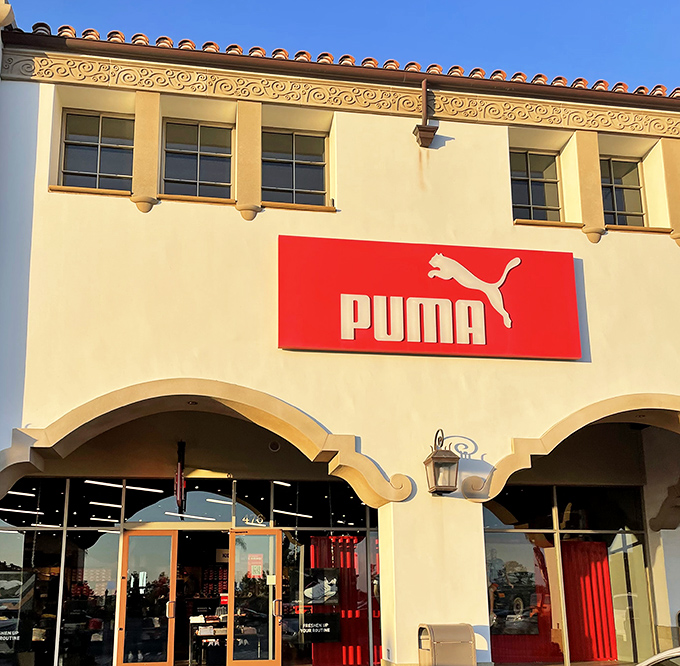 Puma's bold red signage against crisp white stucco&mdash;like a siren call to those who want their athletic wear with a dash of European flair.