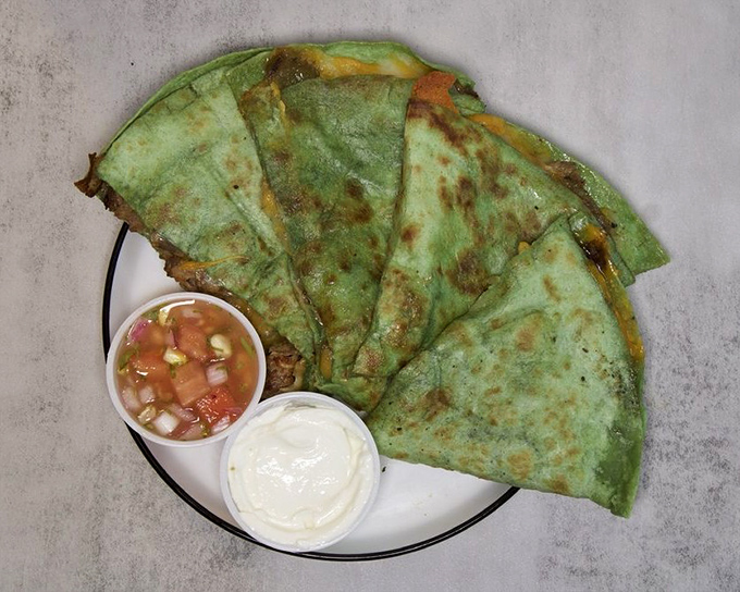 This vibrant green quesadilla proves that Howley's isn't just about American classics – they've mastered cross-border comfort food too.