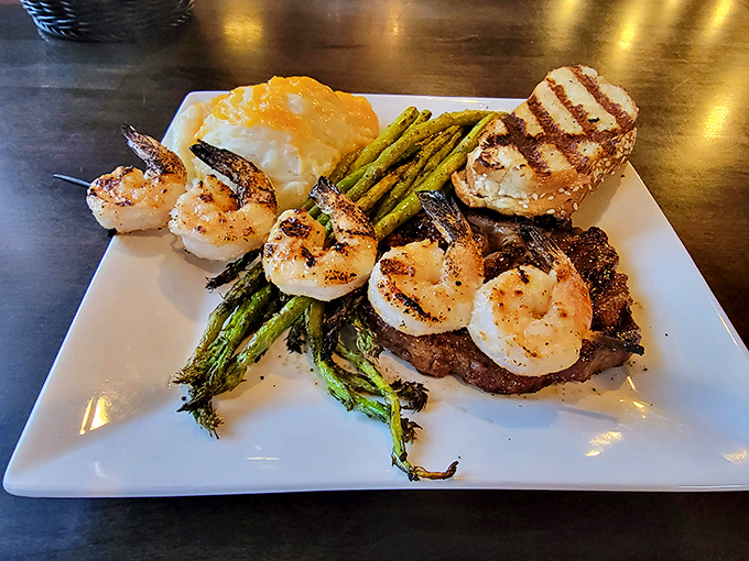 Surf meets turf in perfect harmony, like the culinary equivalent of Sinatra and Martin sharing a stage and a perfectly chilled martini.