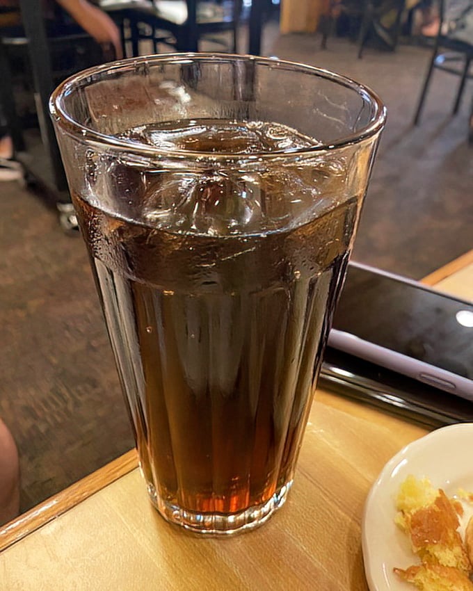 Root beer in a proper glass&mdash;dark, fizzy, and nostalgic&mdash;the kind of simple pleasure that makes you slow down and appreciate the moment.