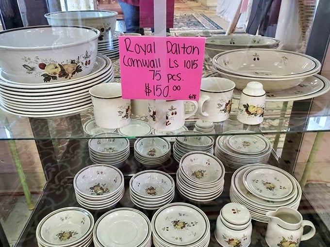 Royal Dalton dinnerware that's seen more elegant meals than I have. Seventy-five pieces of floral-adorned history ready for your next dinner party.