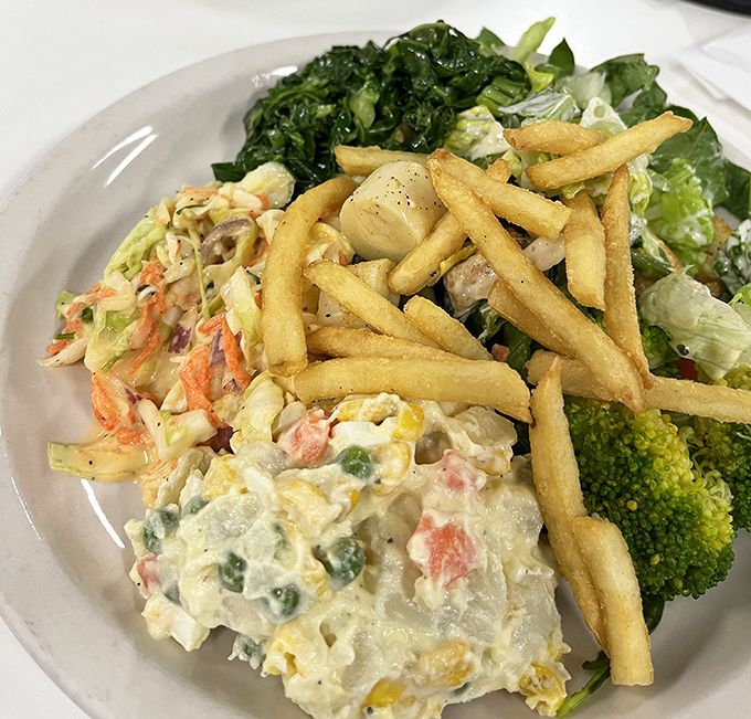 A salad plate that proves Brazilians understand that vegetables deserve respect too&mdash;especially when topped with crispy fries for good measure.