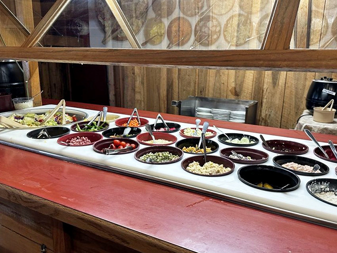 The salad bar&mdash;nature's apology for winter in Indiana. Fresh, colorful, and arranged with the precision of a garden quilt.