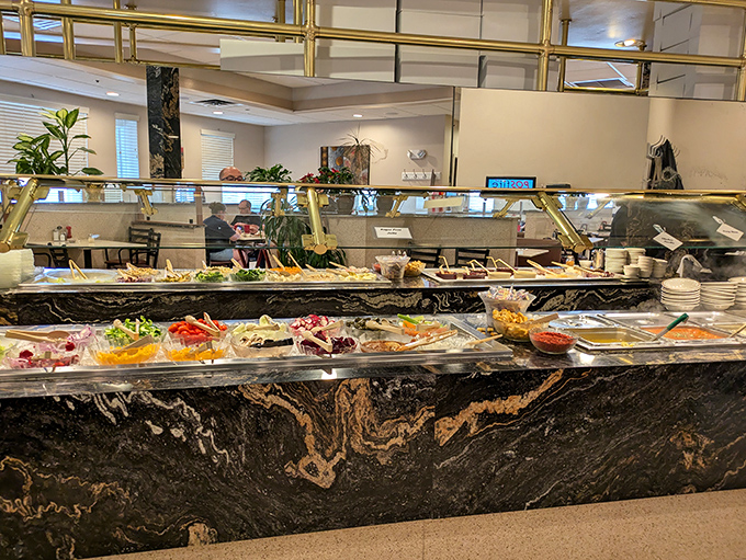 The salad bar gleams like a jewelry counter, if jewels were made of crisp vegetables and creamy dressings that make eating healthy feel like cheating.