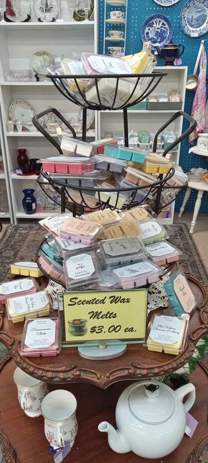 Scented wax melts arranged like a fragrant color wheel. Your nose can travel from cinnamon to sea breeze faster than your Florida relatives heading north for summer.