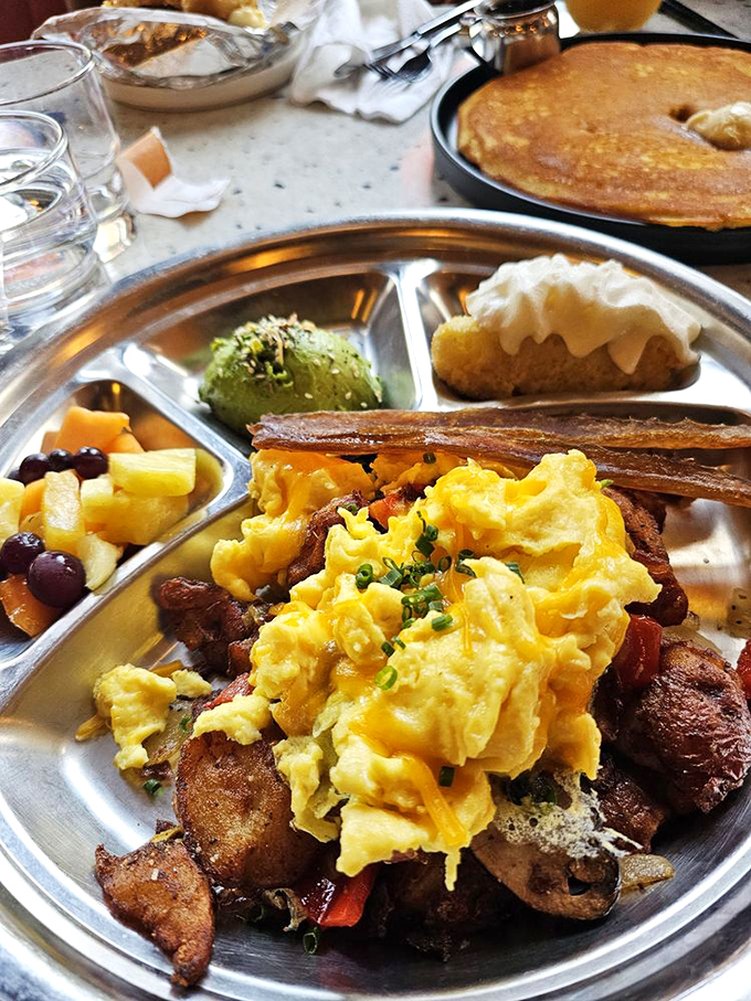 When scrambled eggs meet home fries in a breakfast hash topped with melted cheese, Monday mornings suddenly don't seem so bad.