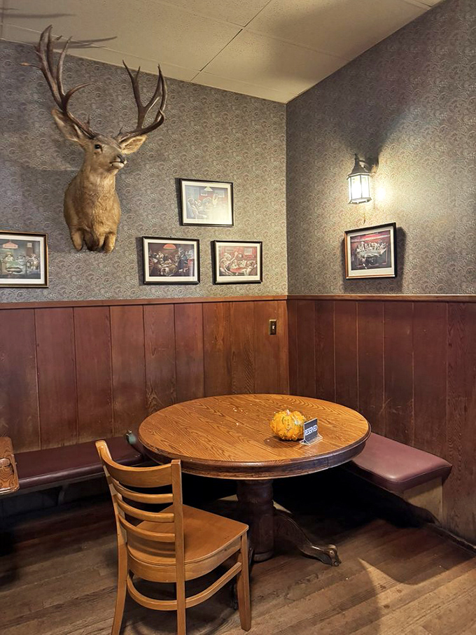 A cozy corner booth watched over by local wildlife&mdash;the perfect spot to linger over pie and coffee after your seafood feast.