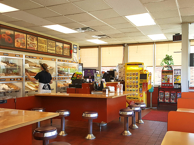 The command center where donut dreams become reality and breakfast orders transform into edible happiness delivered across the counter with a smile.