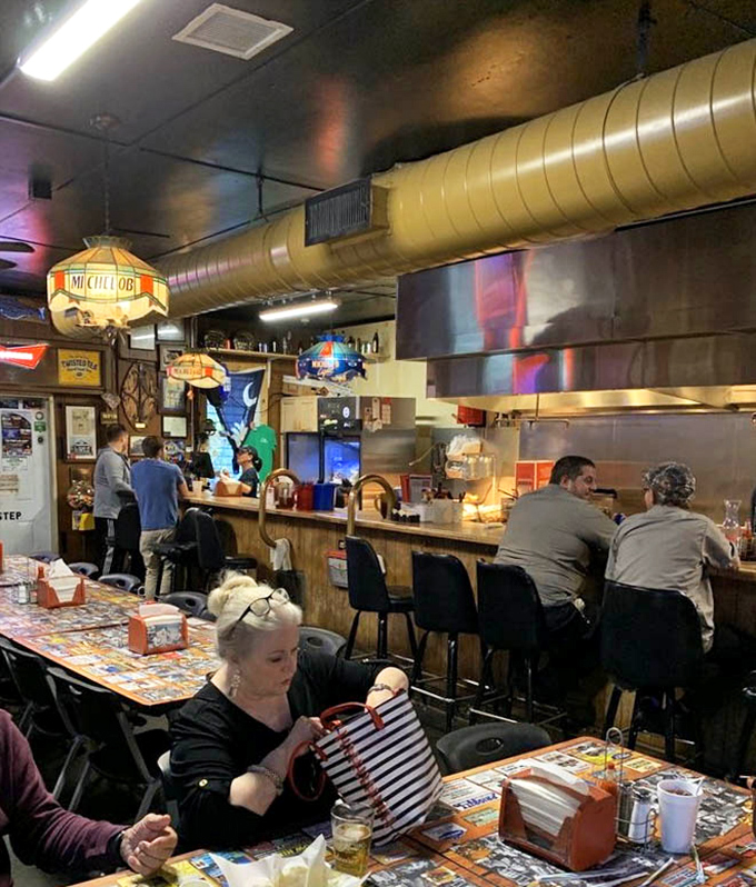 The service counter displays the organized chaos of a place that's been perfecting the burger game for locals and pilgrims alike daily.