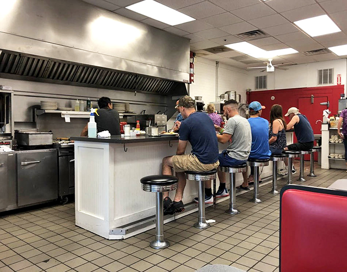 The kitchen &ndash; where breakfast alchemy happens amid the controlled chaos of sizzling bacon and pancake batter transforming into golden discs of joy.