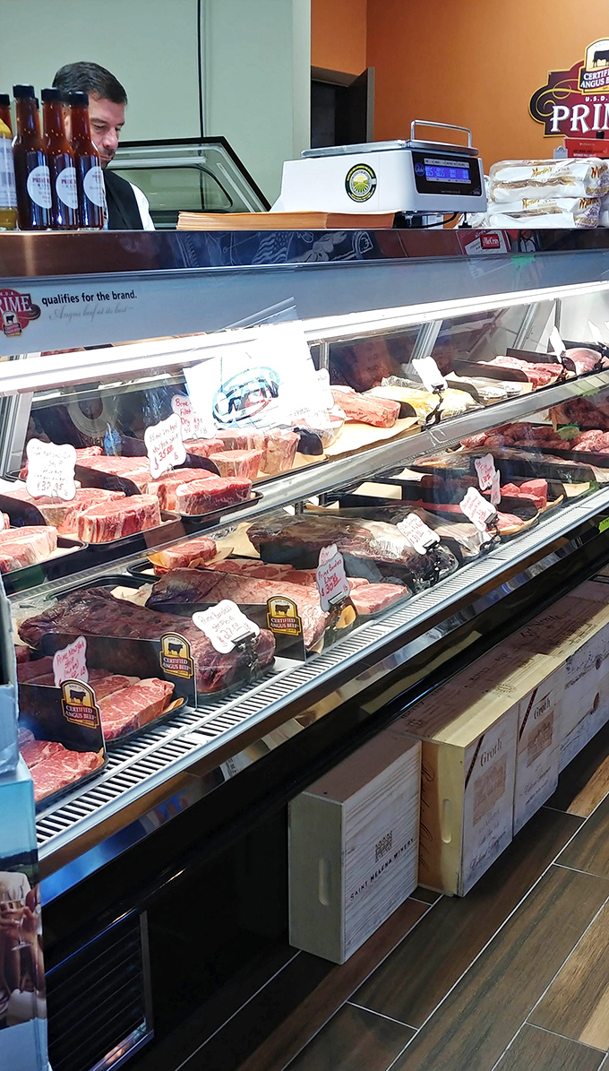 Behind this counter, prime cuts await their destiny. Like a beef library where every selection tells a different delicious story.