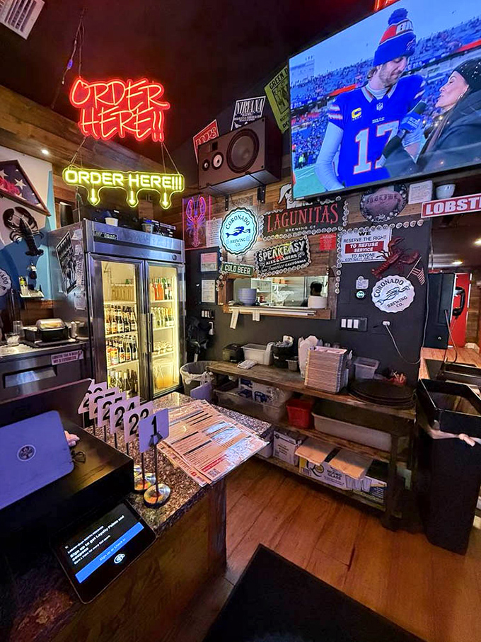 The "ORDER HERE" neon sign glows like a beacon guiding hungry sailors to port after a long journey through traffic.