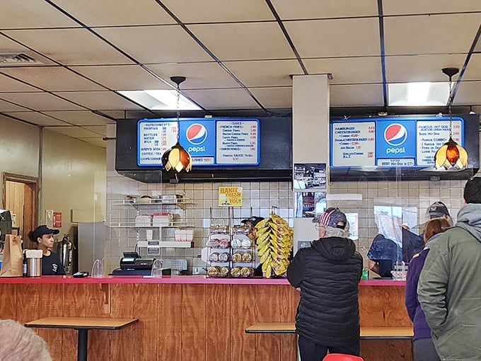 Where the magic happens &ndash; the counter where generations have placed orders, exchanged pleasantries, and anticipated the arrival of that famous sauce.