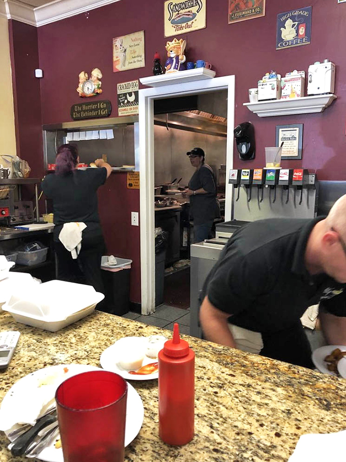 A glimpse into the kitchen reveals the organized chaos where breakfast dreams materialize &ndash; spatulas flashing like conductor's batons in a symphony of sizzle.