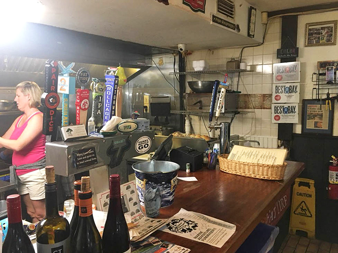 The controlled chaos of a kitchen that knows exactly what it's doing. Those "Best of Bay" awards aren't just decoration&mdash;they're well-earned bragging rights.