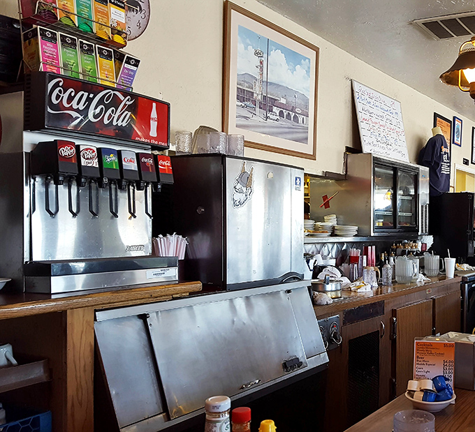 Classic soda fountain meets working kitchen—where the soft drink selection is as reliable as the cooks who've mastered every order timing.