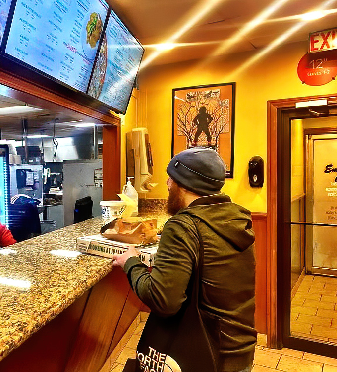 The ordering counter&mdash;that magical threshold where pizza dreams are spoken into existence by hungry patrons.