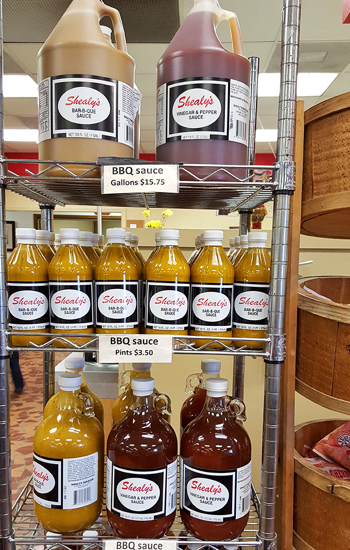Bottles of sauce standing at attention like soldiers guarding flavor. The mustard-based version is South Carolina's liquid gold.