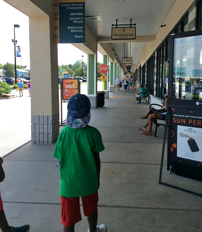 The covered walkways of Tanger provide welcome shade for weary shoppers taking a breather between bargain hunting expeditions.