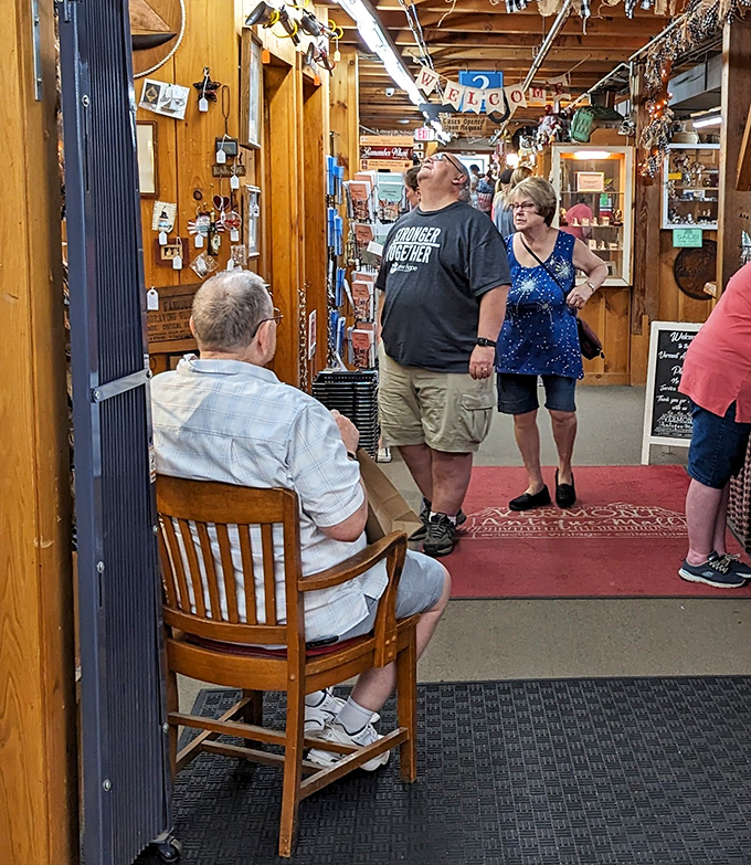 Treasure hunters in their natural habitat. The universal antique store pose: neck craned, eyes wide, mind racing with possibilities.